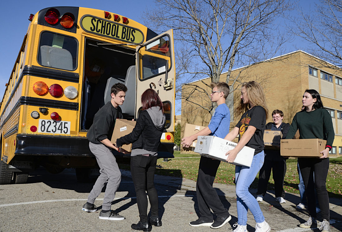 Stuffing the bus for charity in Howland | News, Sports, Jobs - Tribune ...